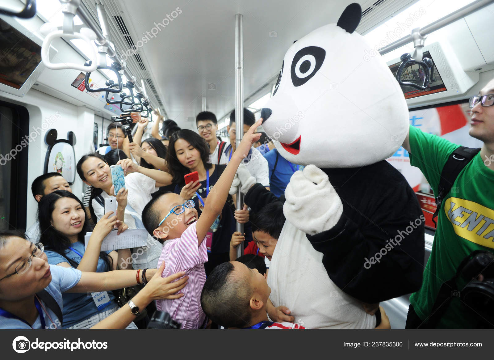 Download - Passengers are pictured on a train running from Xining to ...