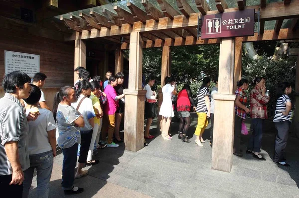 Queue for toilet Stock Photos, Royalty Free Queue for toilet Images ...