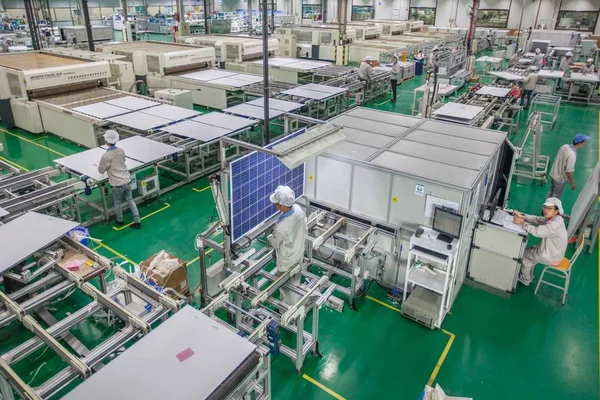 Chinese Workers Assemble Solar Panel Photovoltaic Cells Plant Eoplly ...