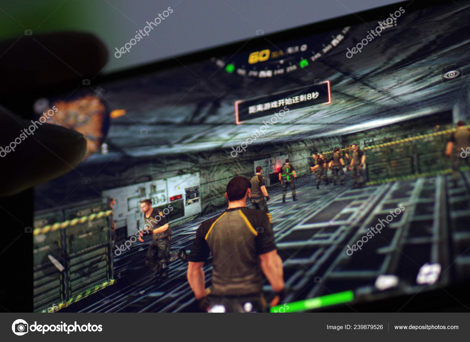 File Chinese Mobile Game Player Plays Tencent's Crossfire Island ...