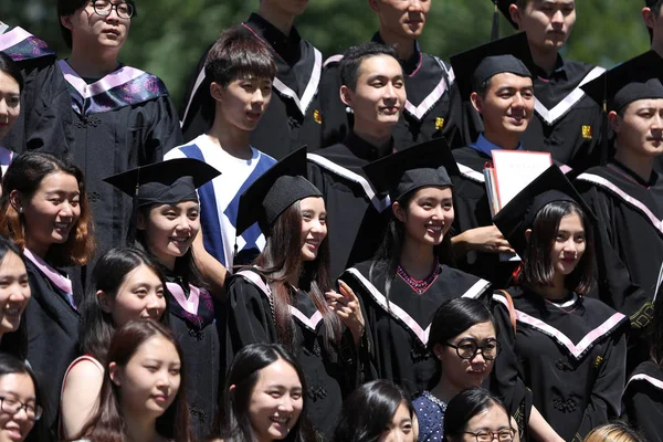 Chinese Graduates Dressed Academic Gowns Wave Graduation Photo Shoot ...