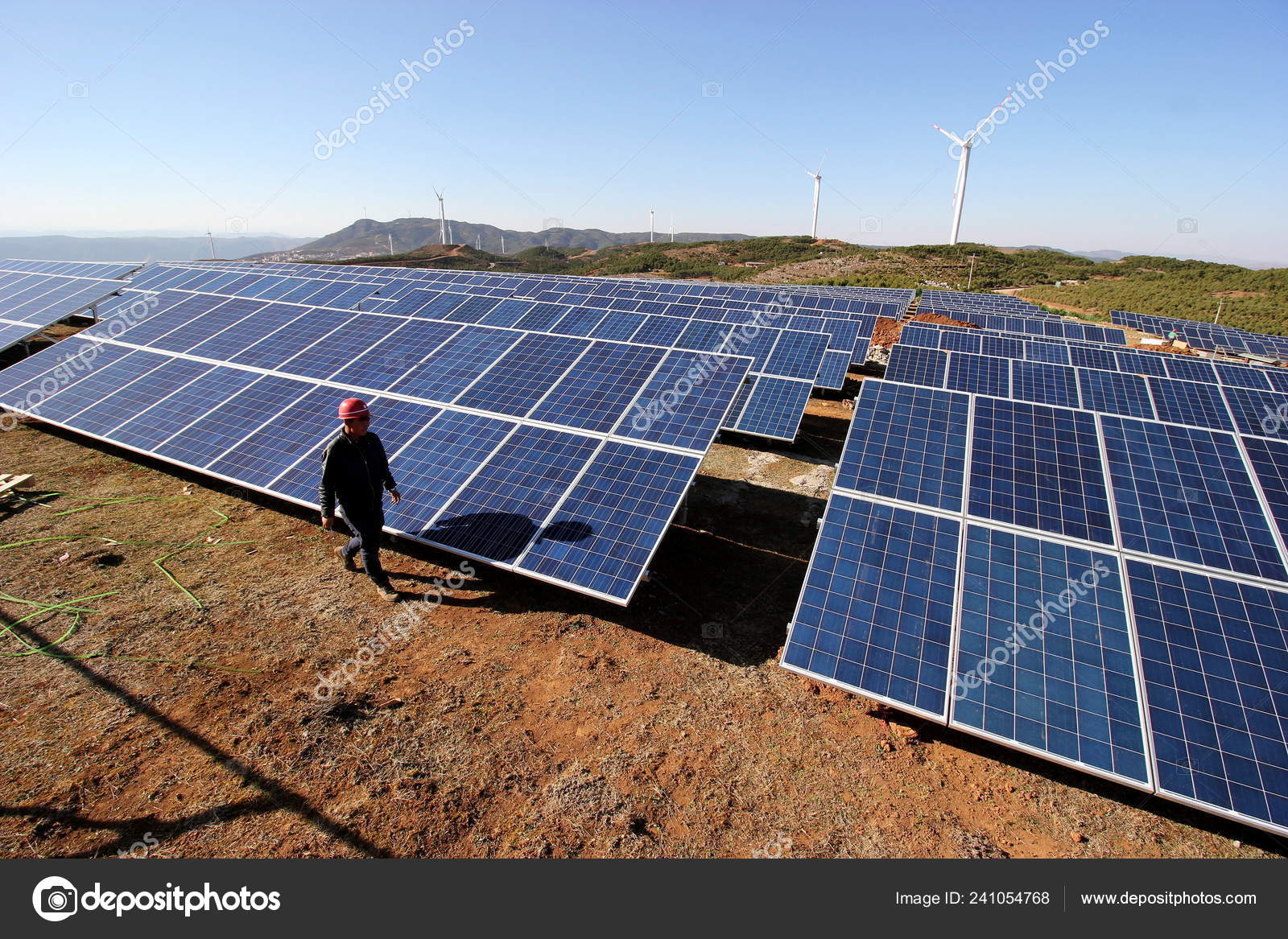 Chinese Worker Walks Arrays Solar Panels Photovoltaic Power Plant ...