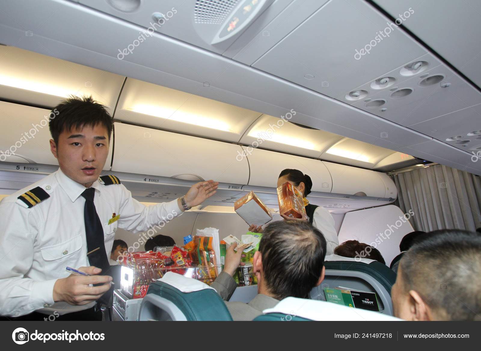Cabin Crew Members Spring Airlines Sell Products Flight Harbin City ...