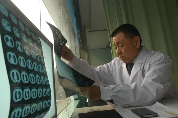Chinese Invigilator Looks Screens Showing Live Footages Surveillance ...