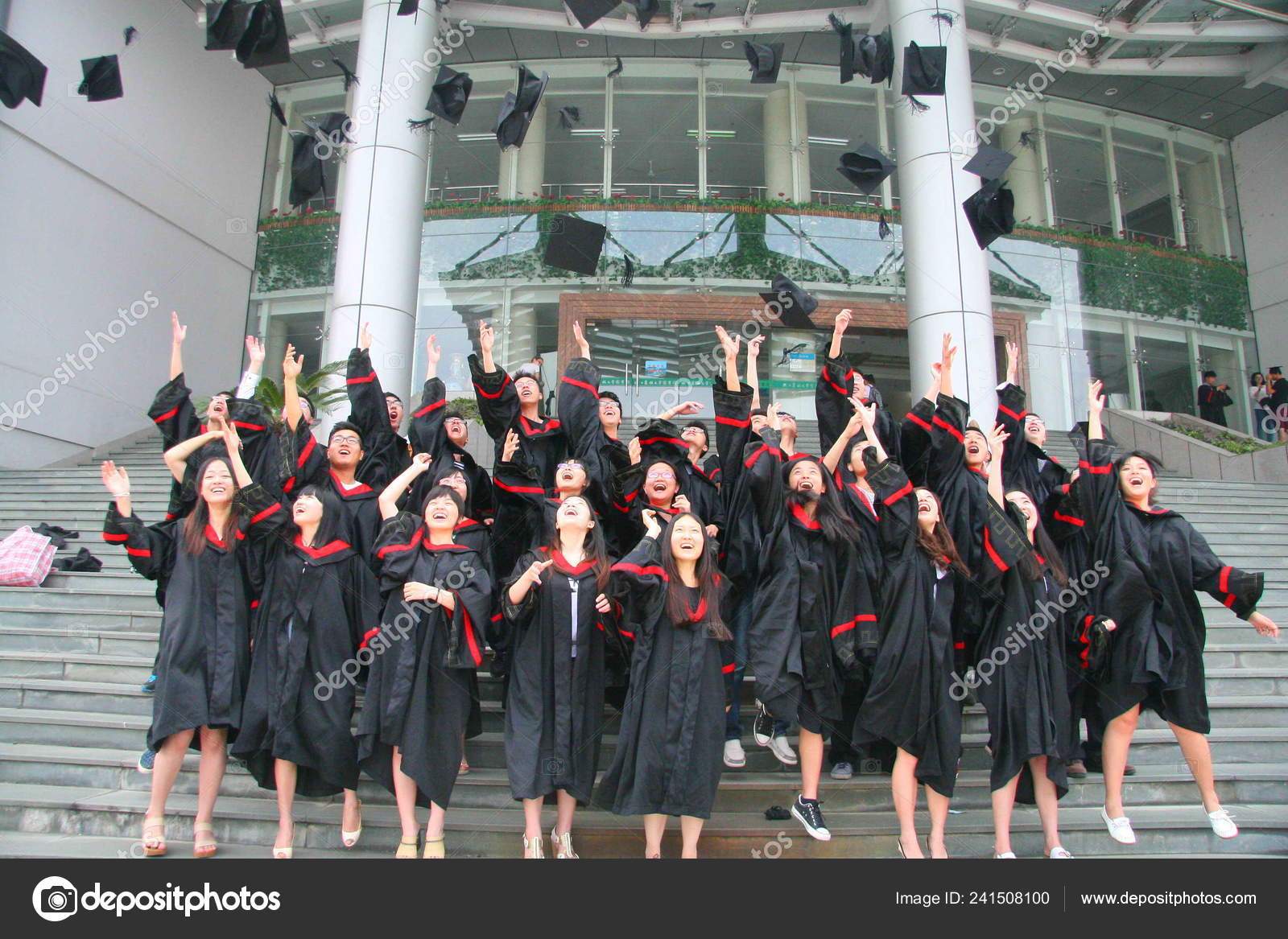 Chinese Graduates Dressed Baccalaureate Gowns Throw Hats Air Graduation ...