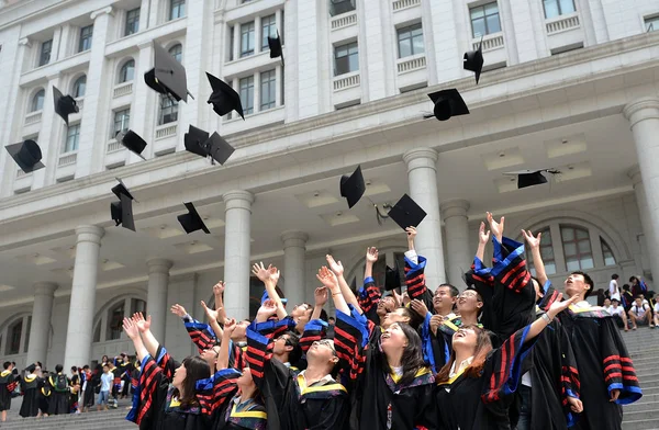 Female Chinese Graduates Dressed Academic Gowns Take Selfie Graduation ...