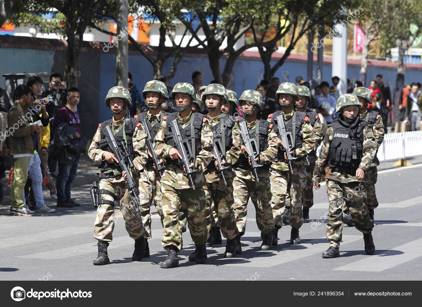 Armed Chinese Paramilitary Policemen Patrol Kunming Railway Station ...