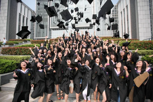Female Chinese Graduates Dressed Academic Gowns Take Selfie Graduation ...