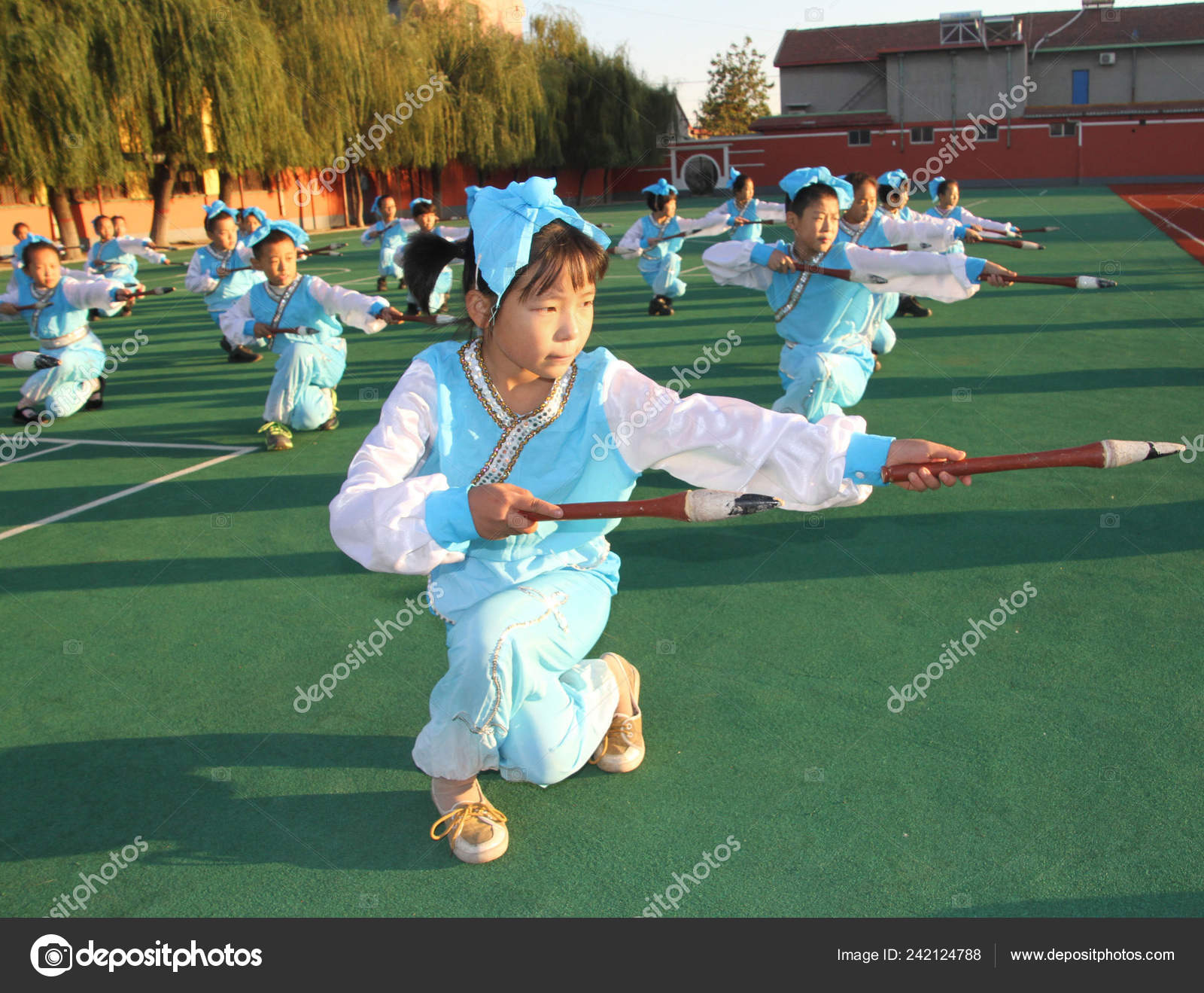 Young Chinese Students Practice Calligraphy Themed Physical Exercises ...
