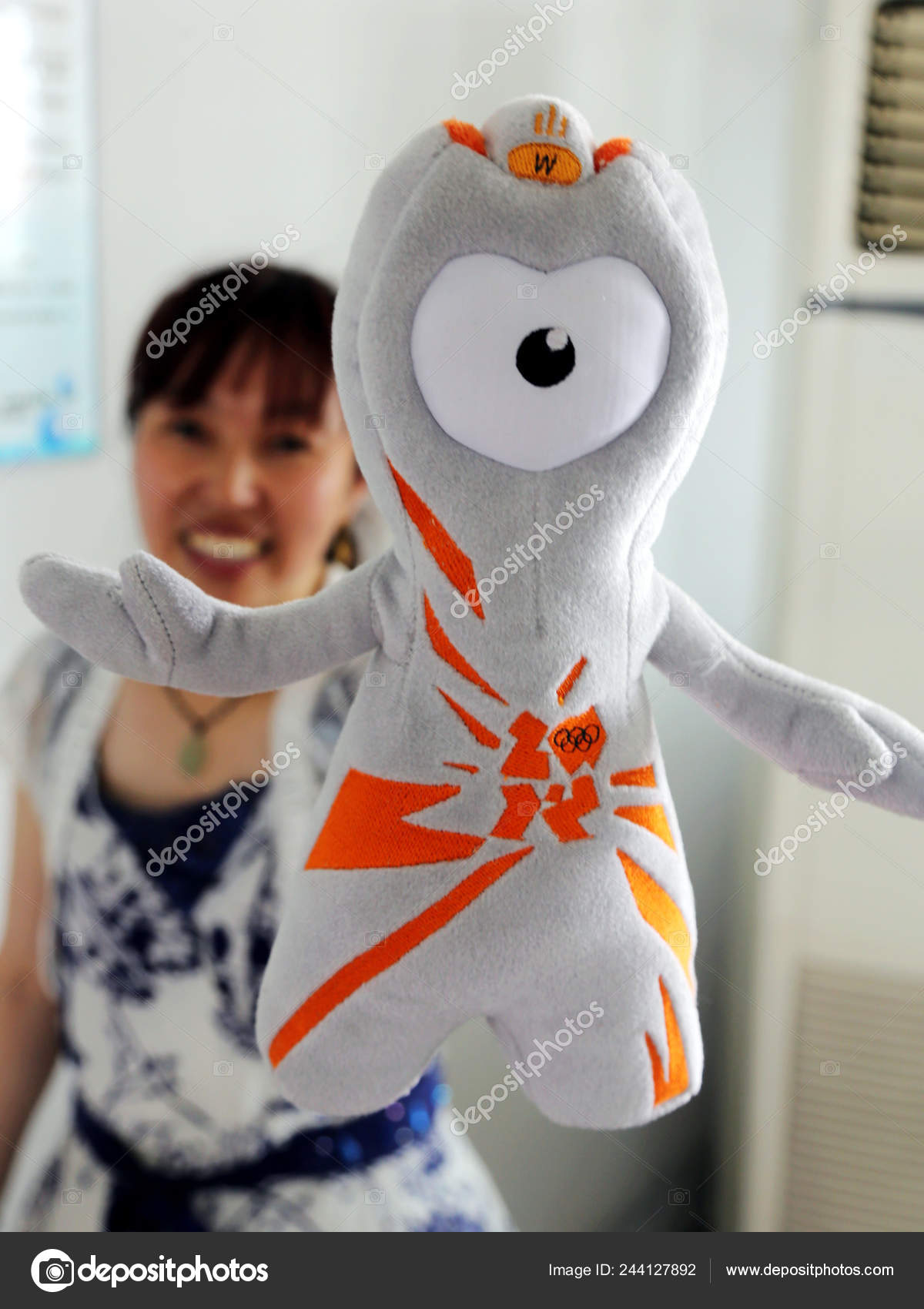 Chinese Worker Shows Toy Wenlock Mascot London 2012 Olympic Games ...