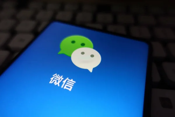 Chinese Mobile Phone User Uses Messaging App Weixin Wechat Tencent ...