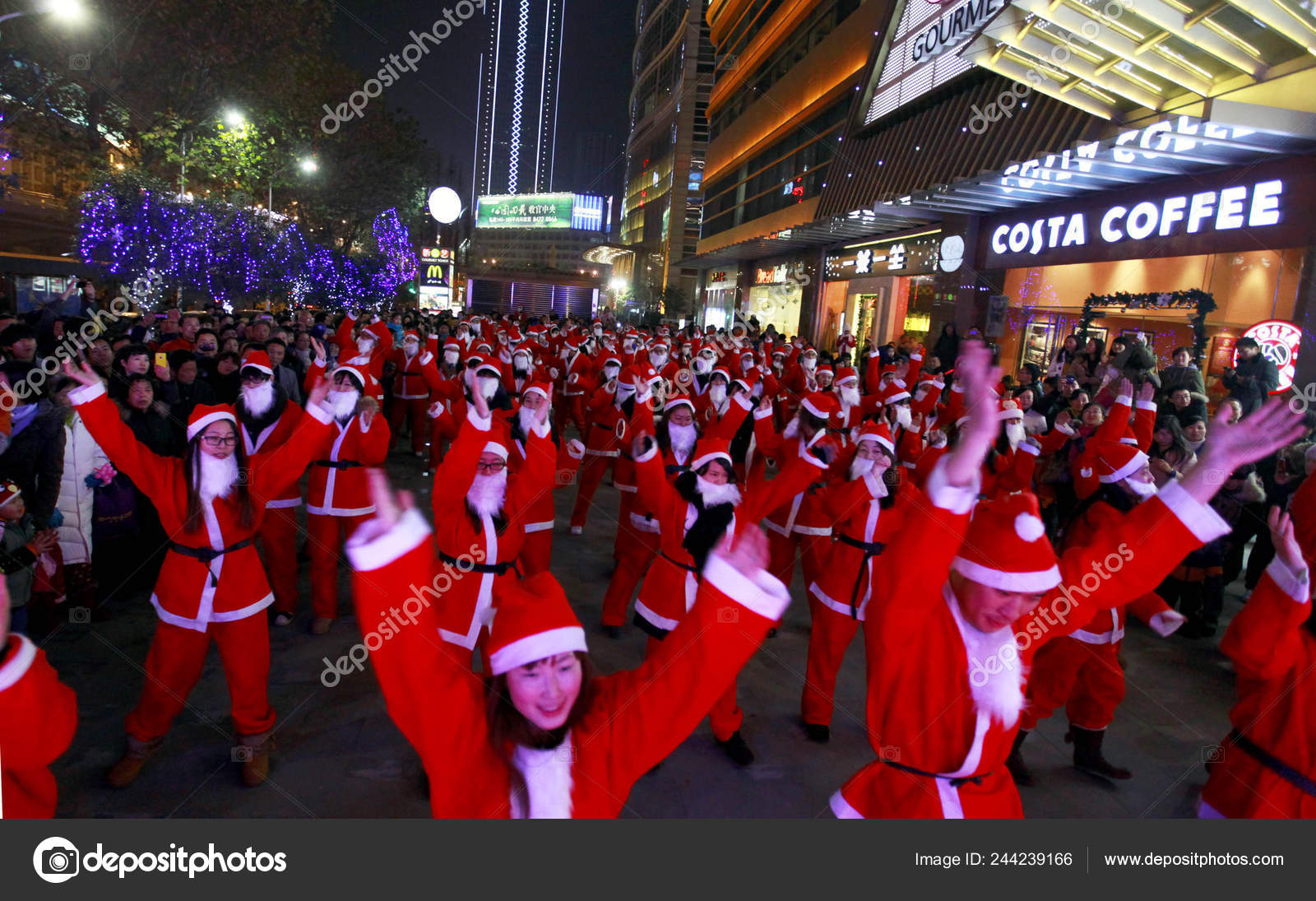 Young Chinese People Dressed Santa Claus Costumes Perform Gangnam Style ...