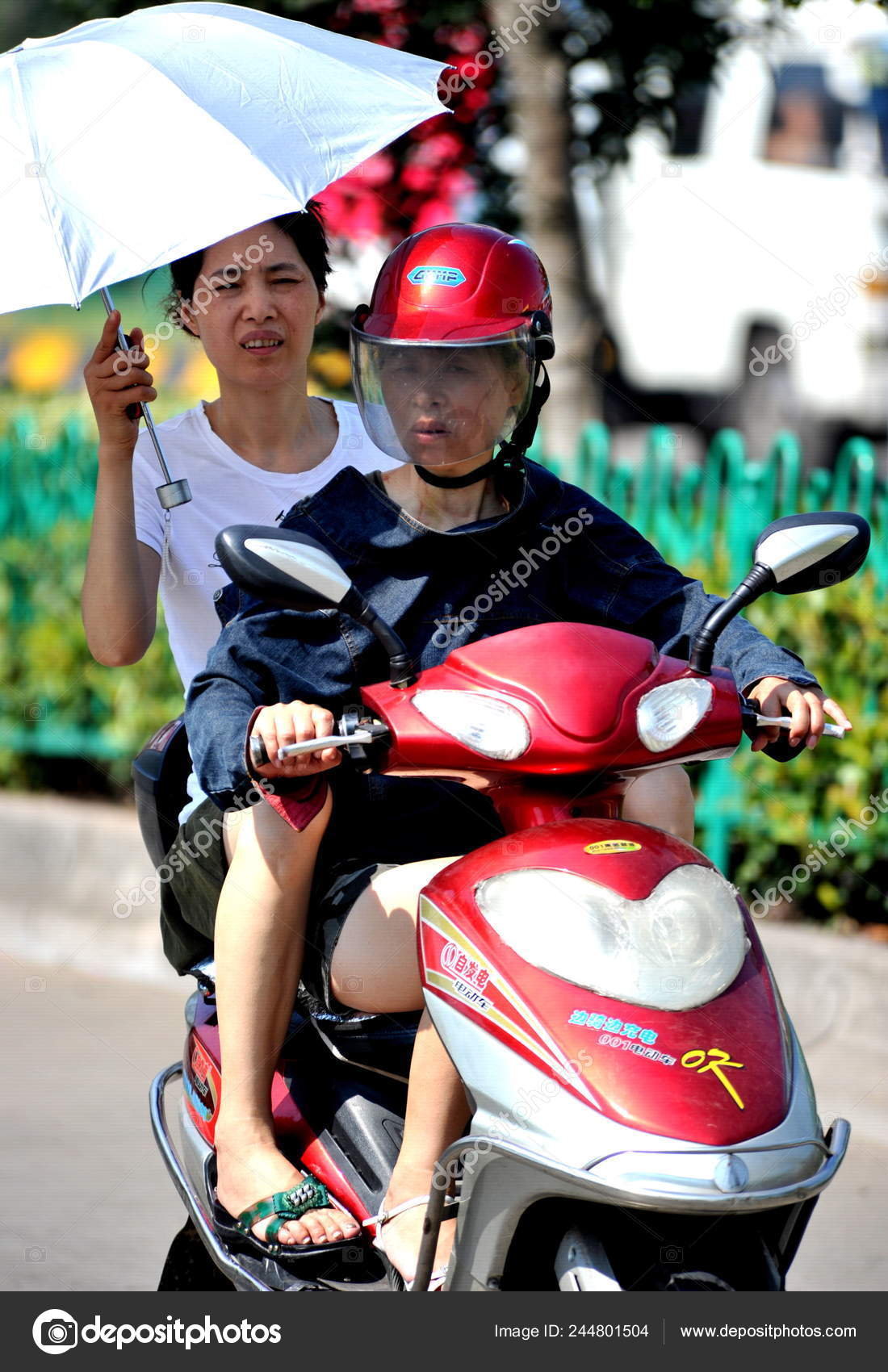 Chinese Cyclists Ride Scooter Scorching Sunshine Street Sweltering ...