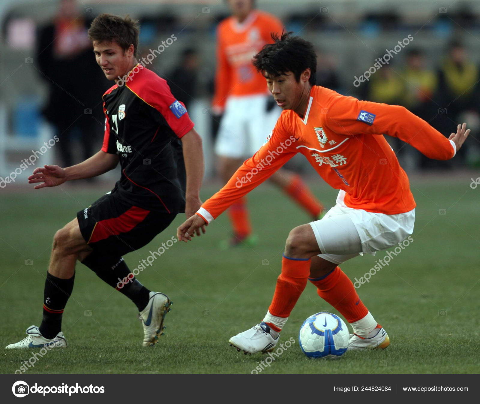 Han Peng Chinas Shandong Luneng Controls Ball While Competing ...