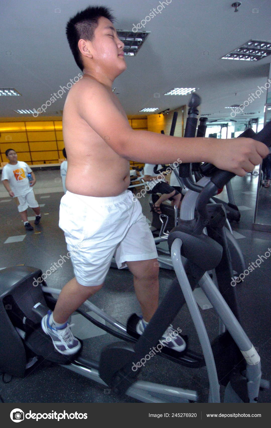 Obese Chinese Child Exercises Stepper Weight Reduction Summer Camp ...