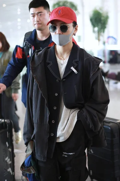 Chinese Singer Bibi Zhou Bichang Arrives Beijing Capital International ...