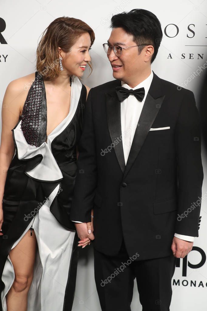 La modelo y actriz de Hong Kong Cathy Tsui y su esposo Martin Lee Ka ...