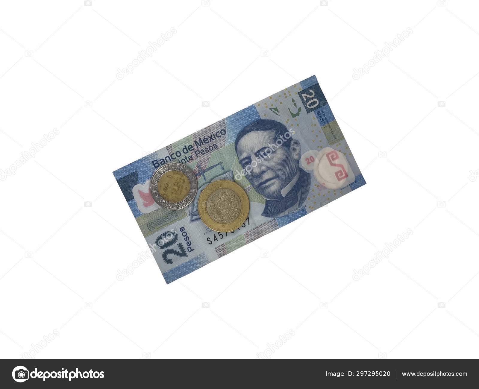 A 20 mexican peso bill with coins on top isolated on white background ...