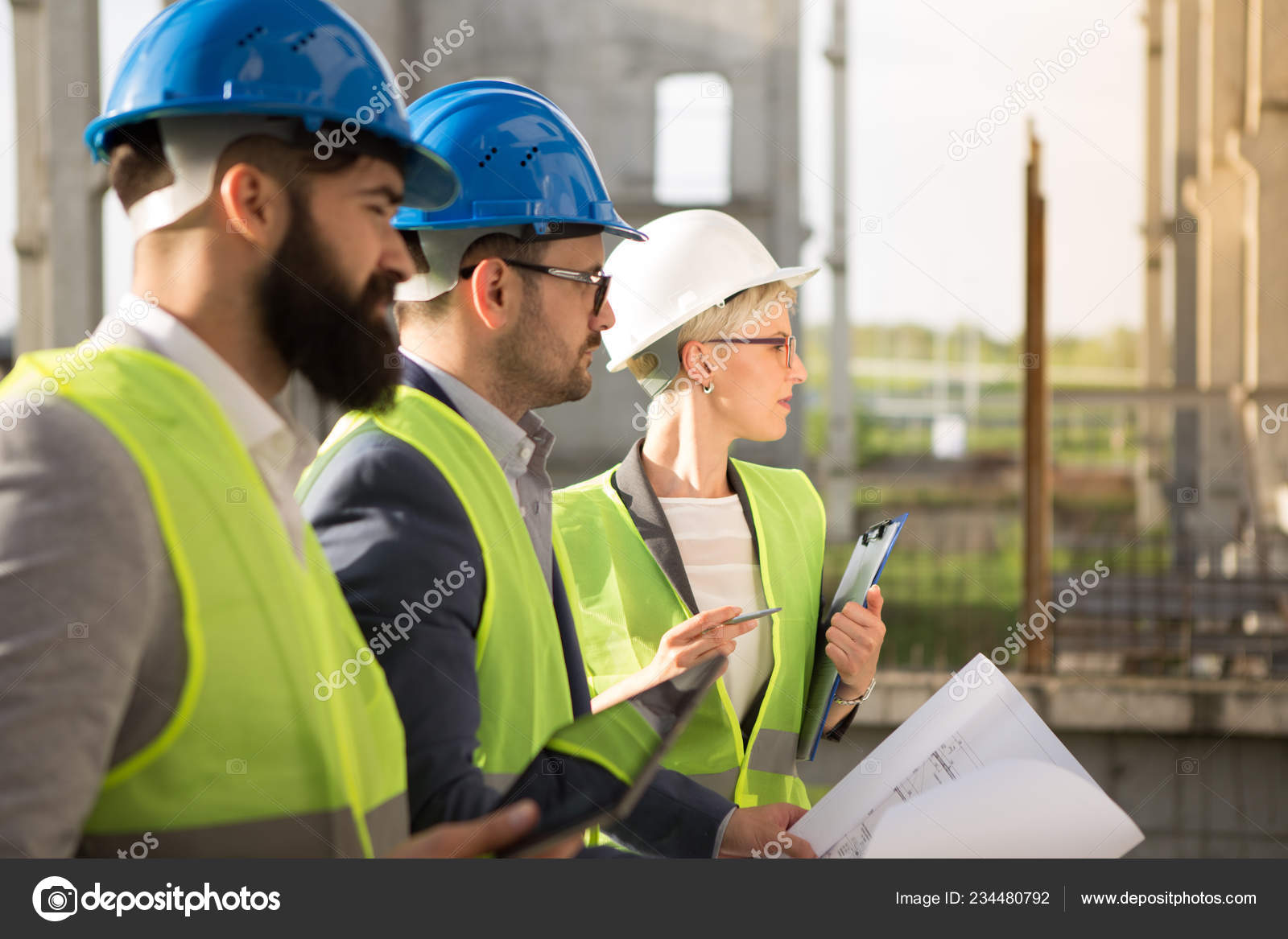 Team Construction Engineers Looks Construction Site Stock Photo by ...