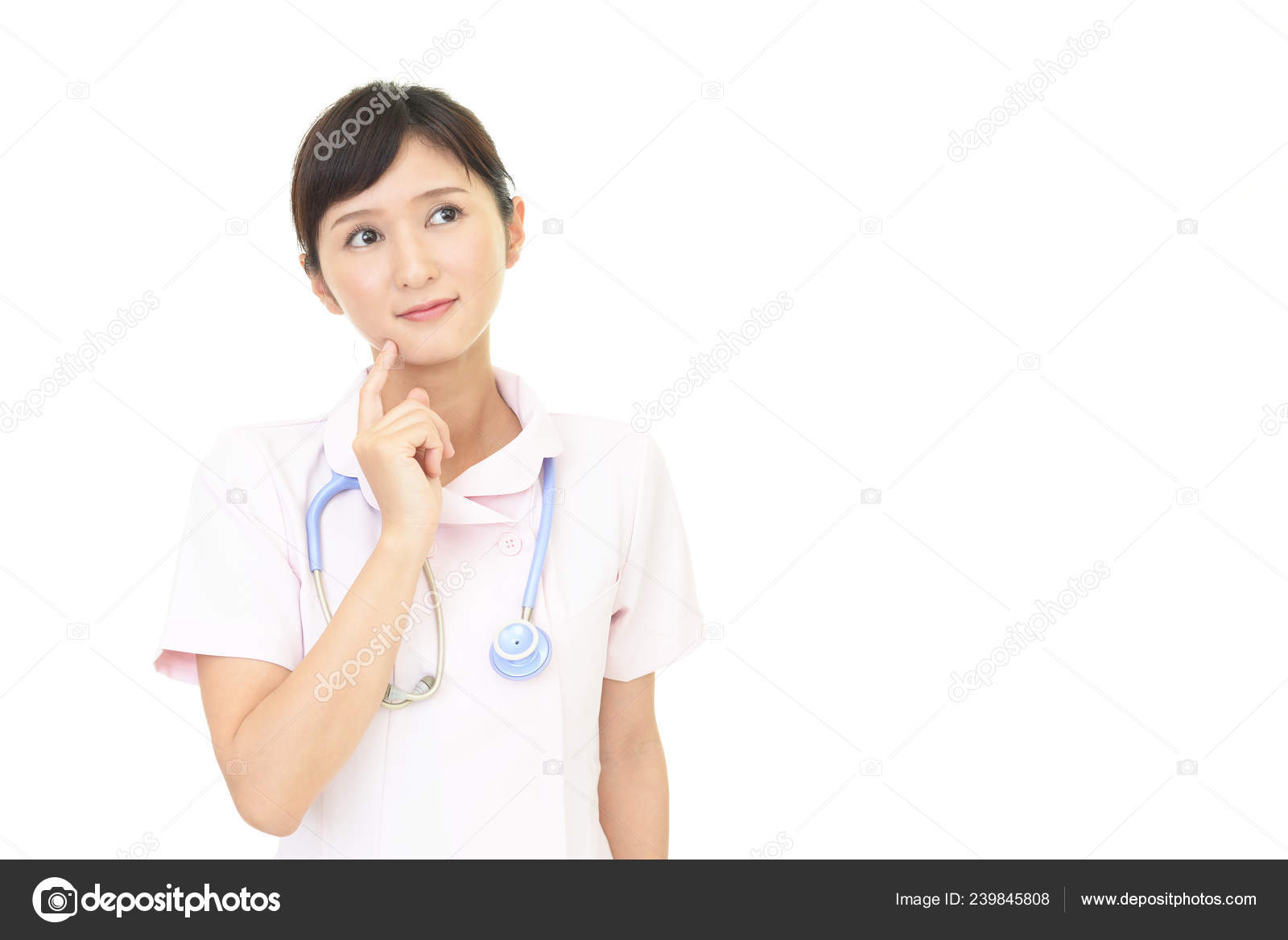 Portrait Thoughtful Young Nurse Thinking — Stock Photo © liza5450 ...
