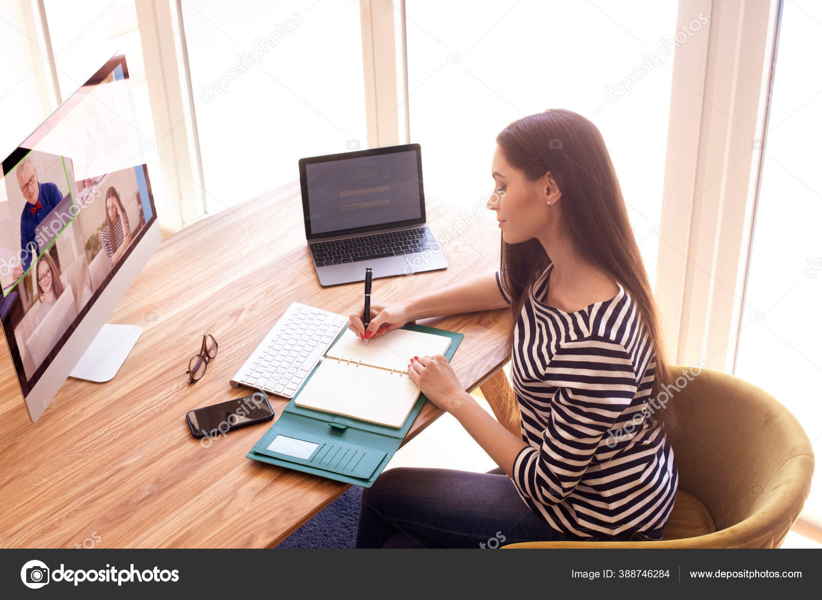 Back Of Woman At Desk