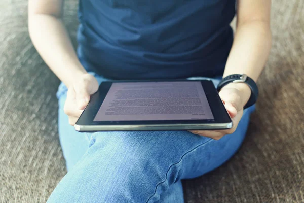 Woman with e-book in hands. - Stock Image - Everypixel