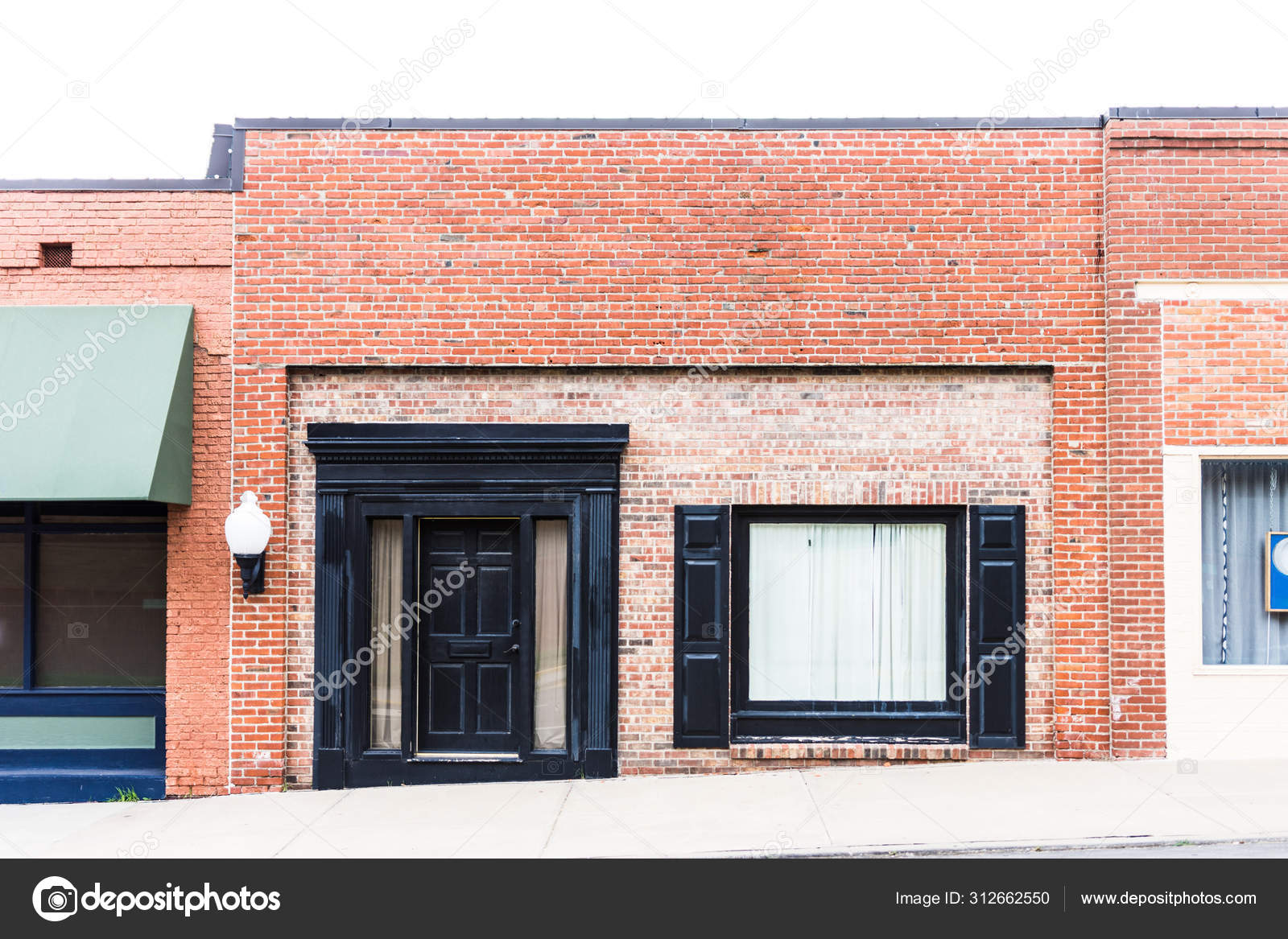 Empty store front in historic shopping area Stock Photo by ©elfachero3 ...