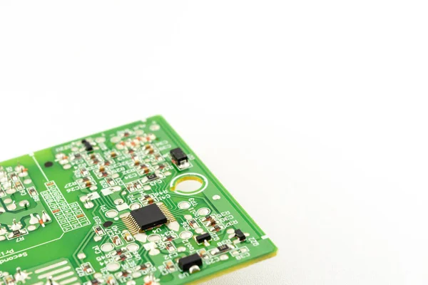 chip on green circuit board isolated white background - Stock Image ...