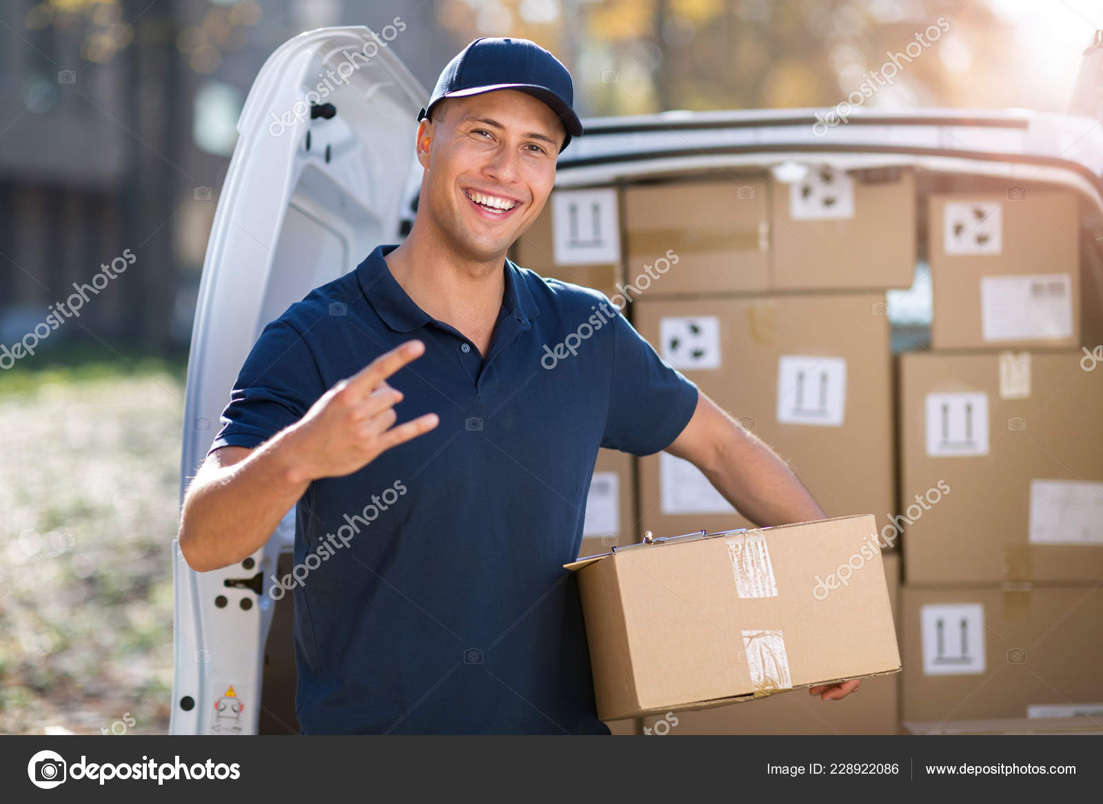 Delivery Man Standing Front His Van Stock Photo by ©pikselstock 228922086
