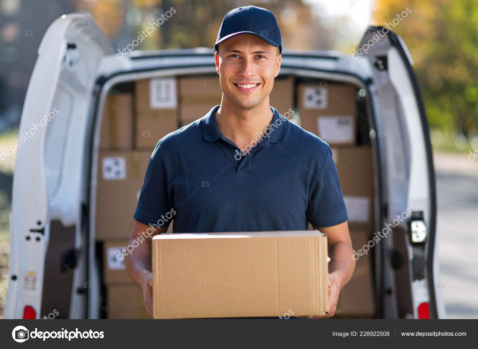 Delivery Man Standing Front His Van Stock Photo by ©pikselstock 228922508