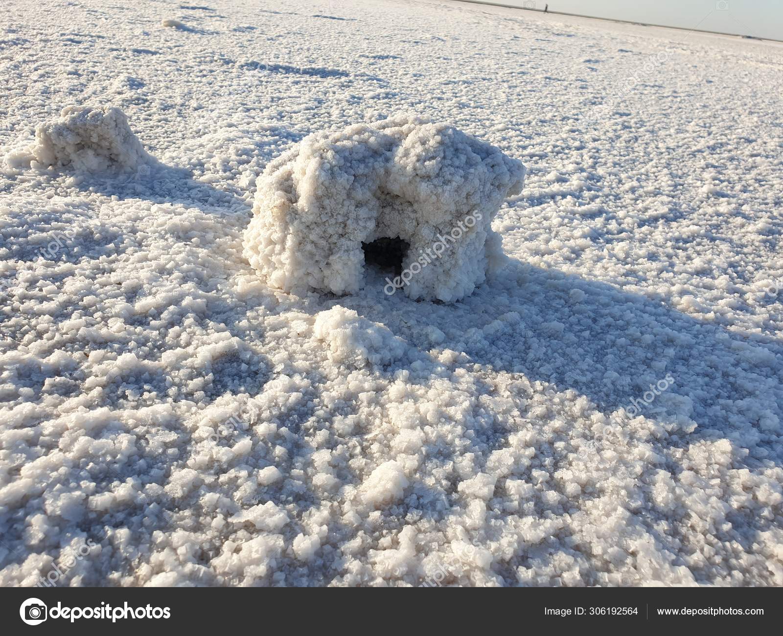Burrow in a salt block on lake Elton at dawn — Stock Photo © yulek1985 ...