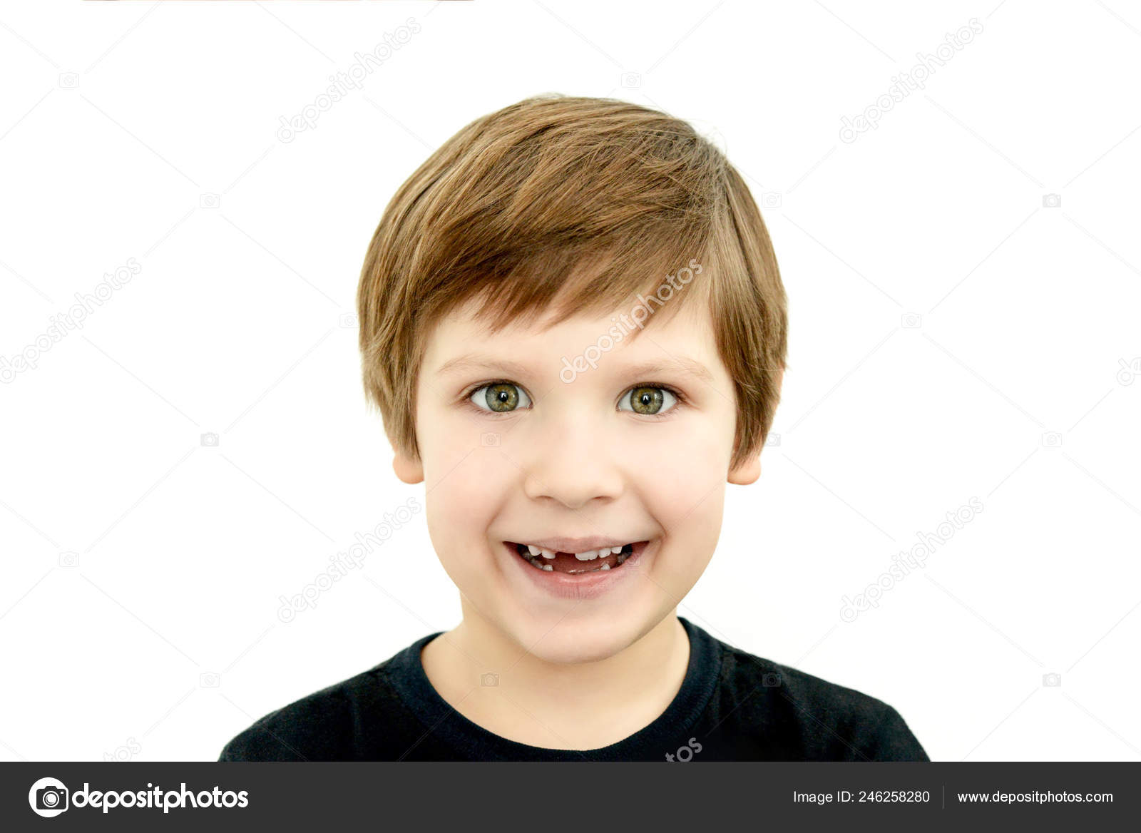 Laughing boy without baby tooth, the absence of a baby tooth, a tooth ...