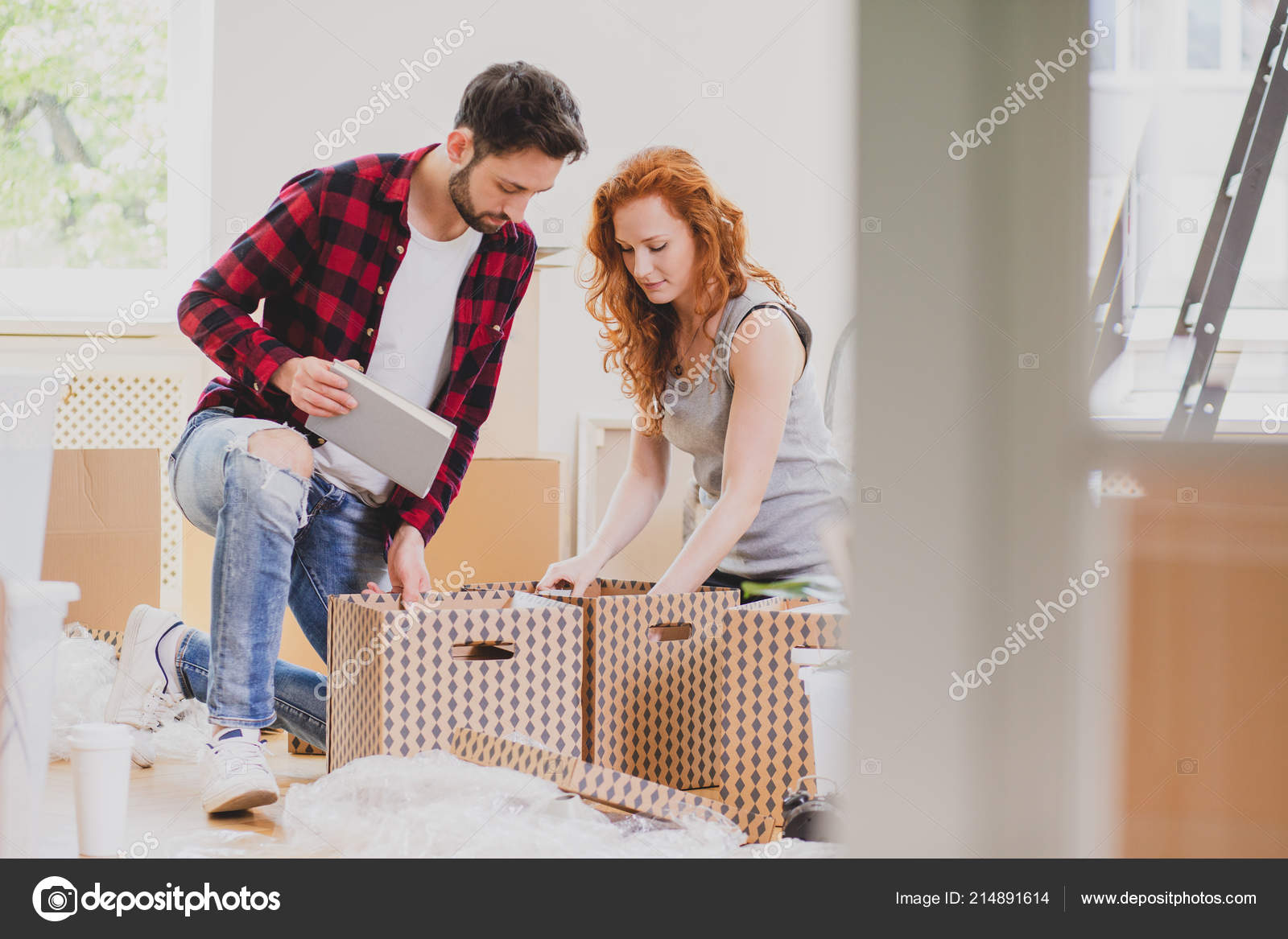 Marriage Packing Stuff Carton Boxes While Moving Out New House Stock ...
