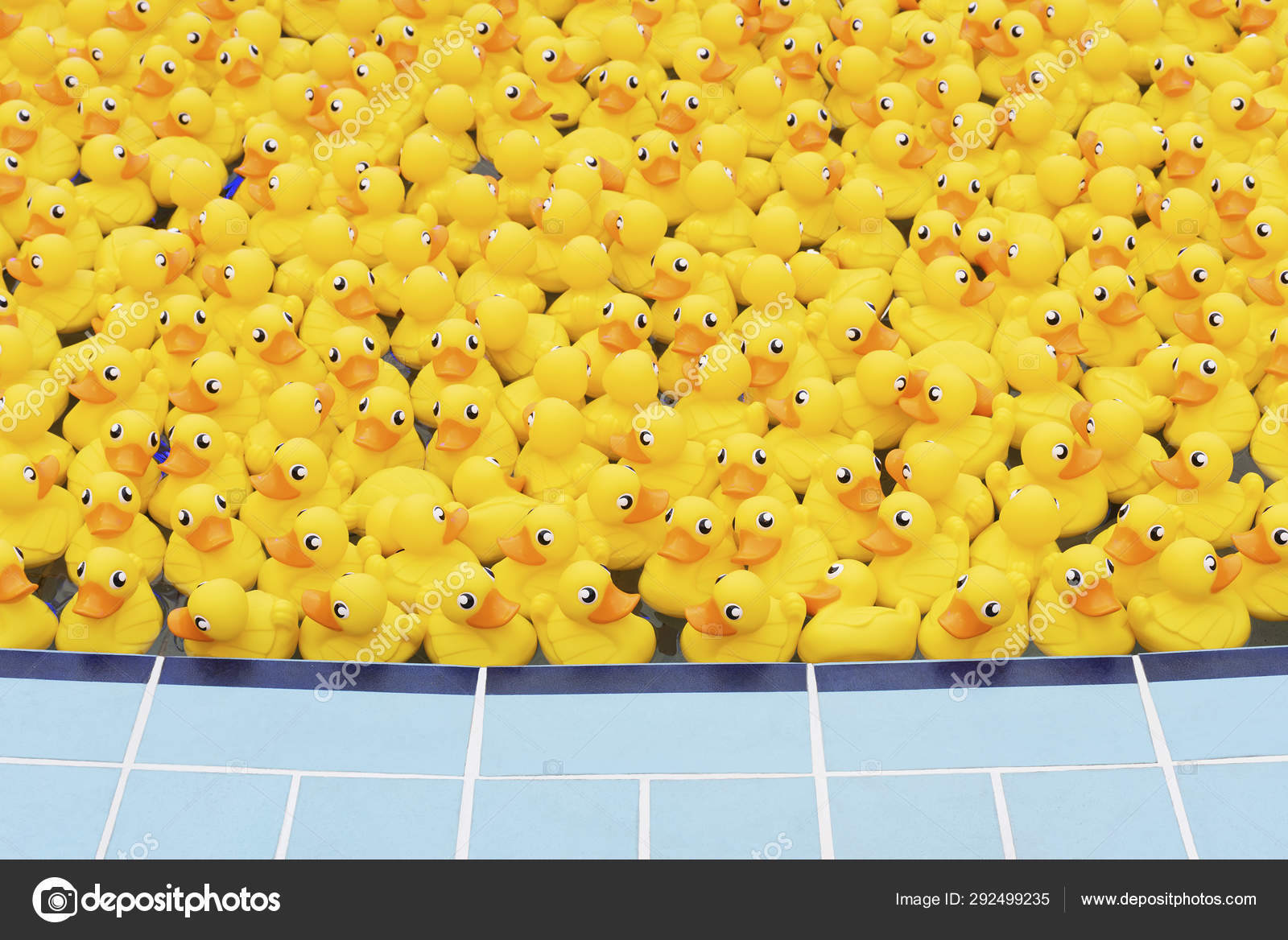 Yellow toy duck floating in the pool — Stock Photo © LeeYiuTung #292499235