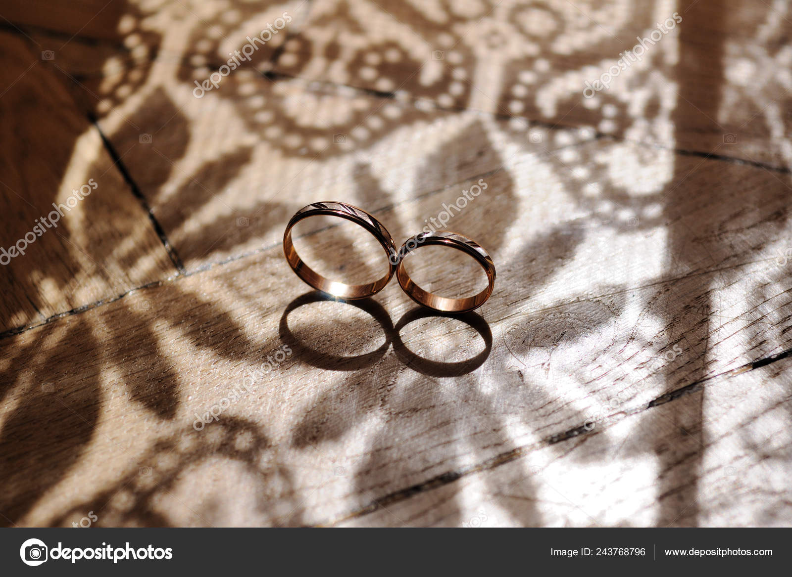 Wedding Rings Beautiful Shadows Stock Photo by ©MariaAvvakumova 243768796