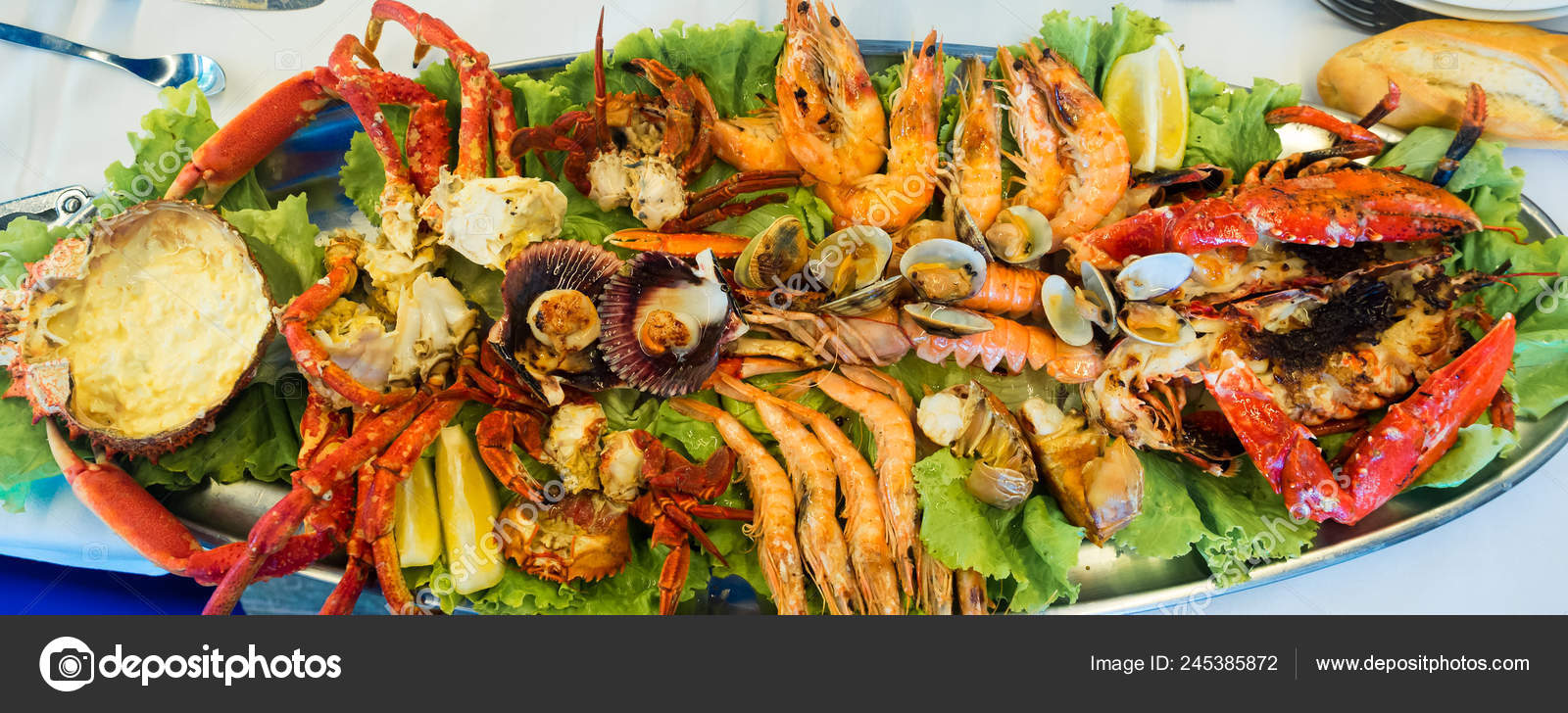 Assortment Grilled Seafood Prawns Lobster Clams Crayfish Scallops Spider Crab Stock Photo by ...