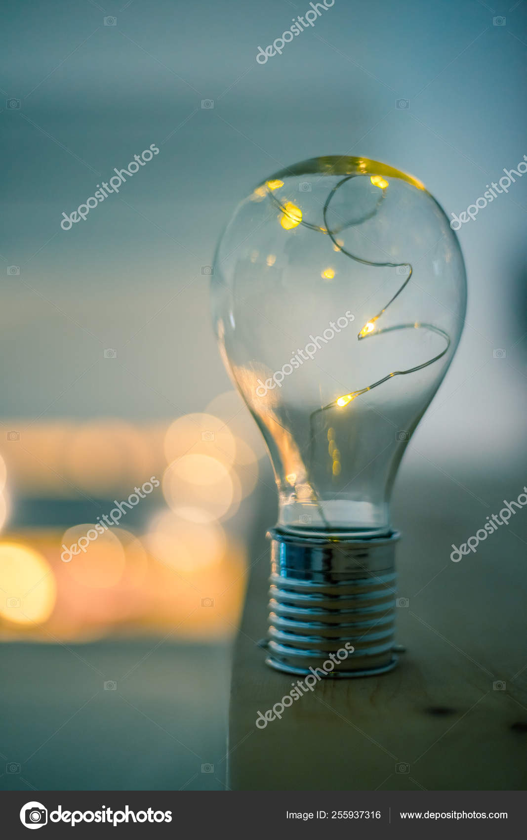 Ideas and innovation: Light bulb with LEDs is lying on a wooden Stock ...