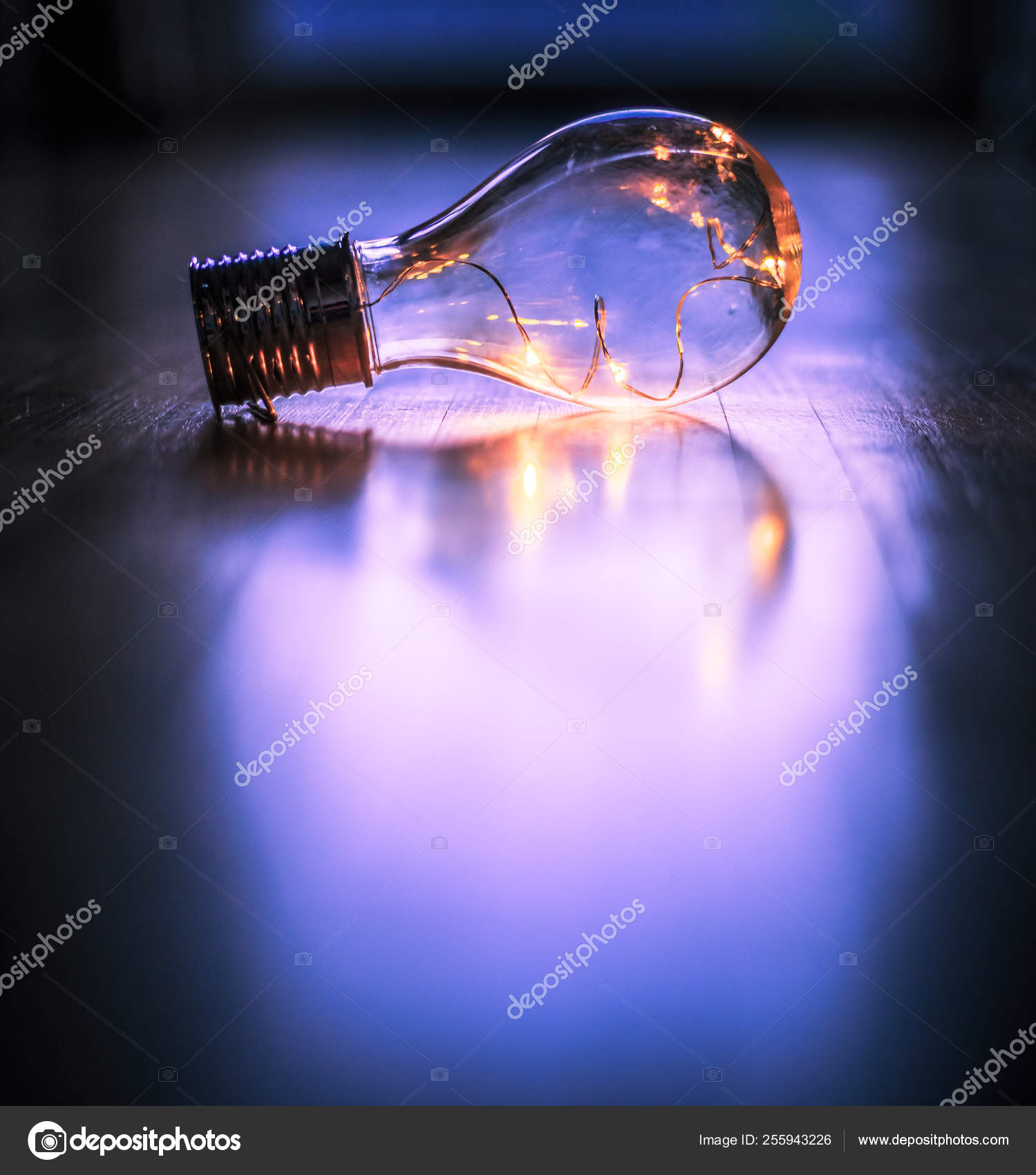 Ideas and innovation: Light bulb with LEDs is lying on the woode Stock ...