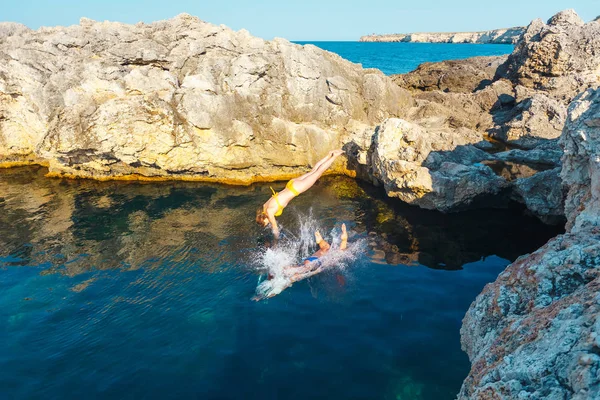 Woman cliff diving Stock Photos, Royalty Free Woman cliff diving Images ...