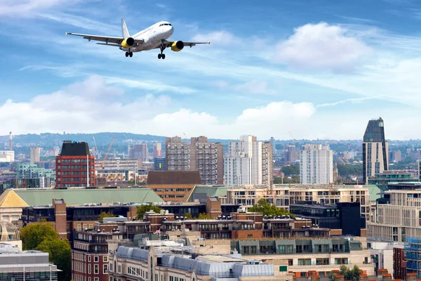 Plane over london Stock Photos, Royalty Free Plane over london Images ...