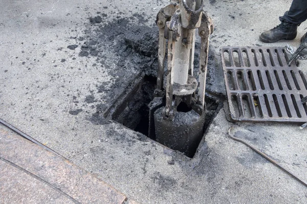 Manhole leak repair Stock Photos, Royalty Free Manhole leak repair ...