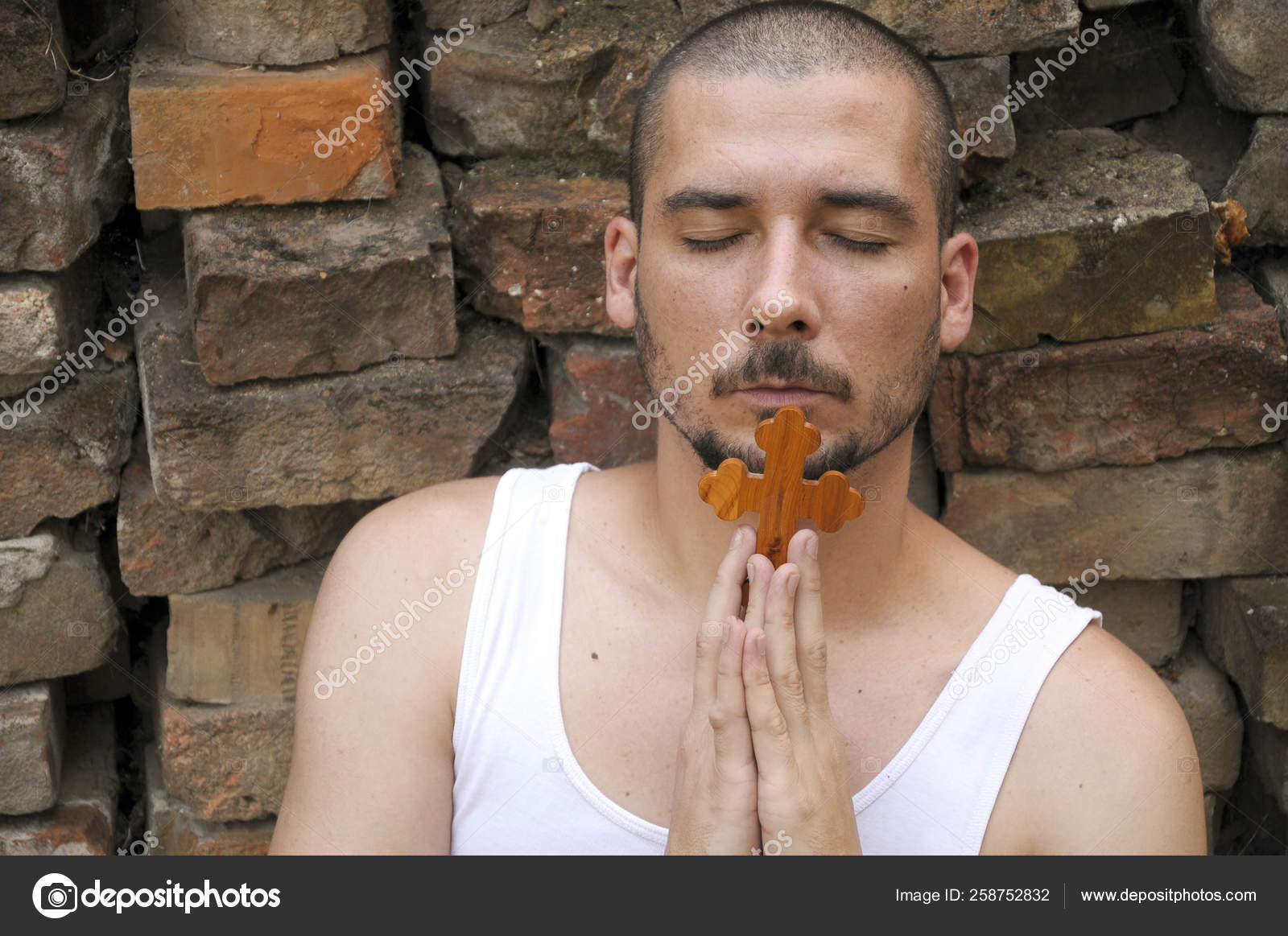 Man Holding Cross Christian Symbol — Stock Photo © serdjophoto #258752832