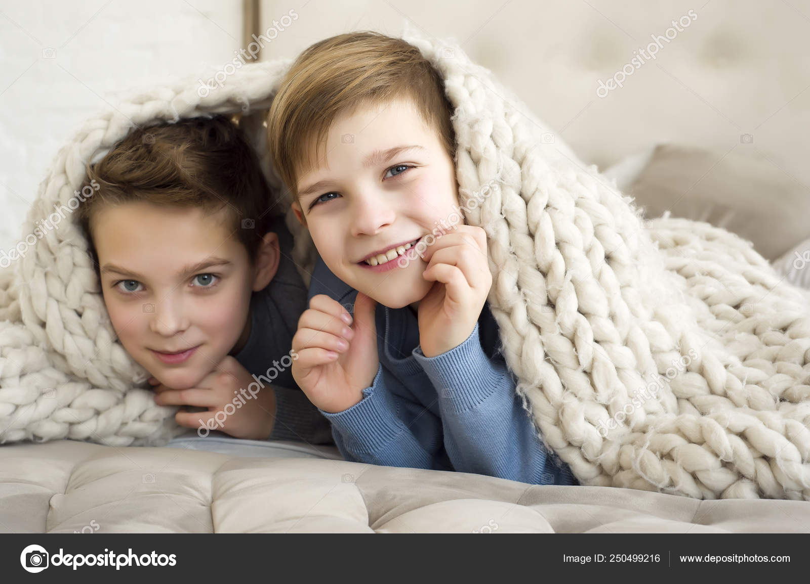 Two Cute Brothers Playing Together Home Smiling Looking Camera Portrait ...