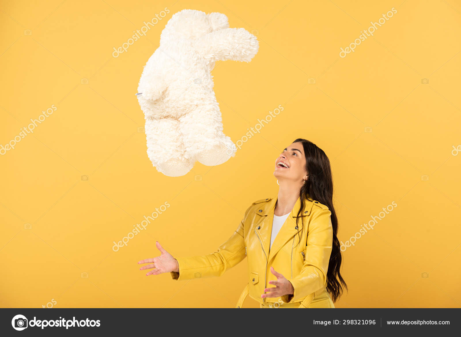 Beautiful Brunette Girl Throwing Teddy Bear Isolated Yellow Stock Photo ...