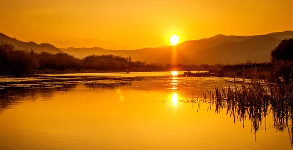 Yellow river sunset landscape Stock Photos, Royalty Free Yellow river ...