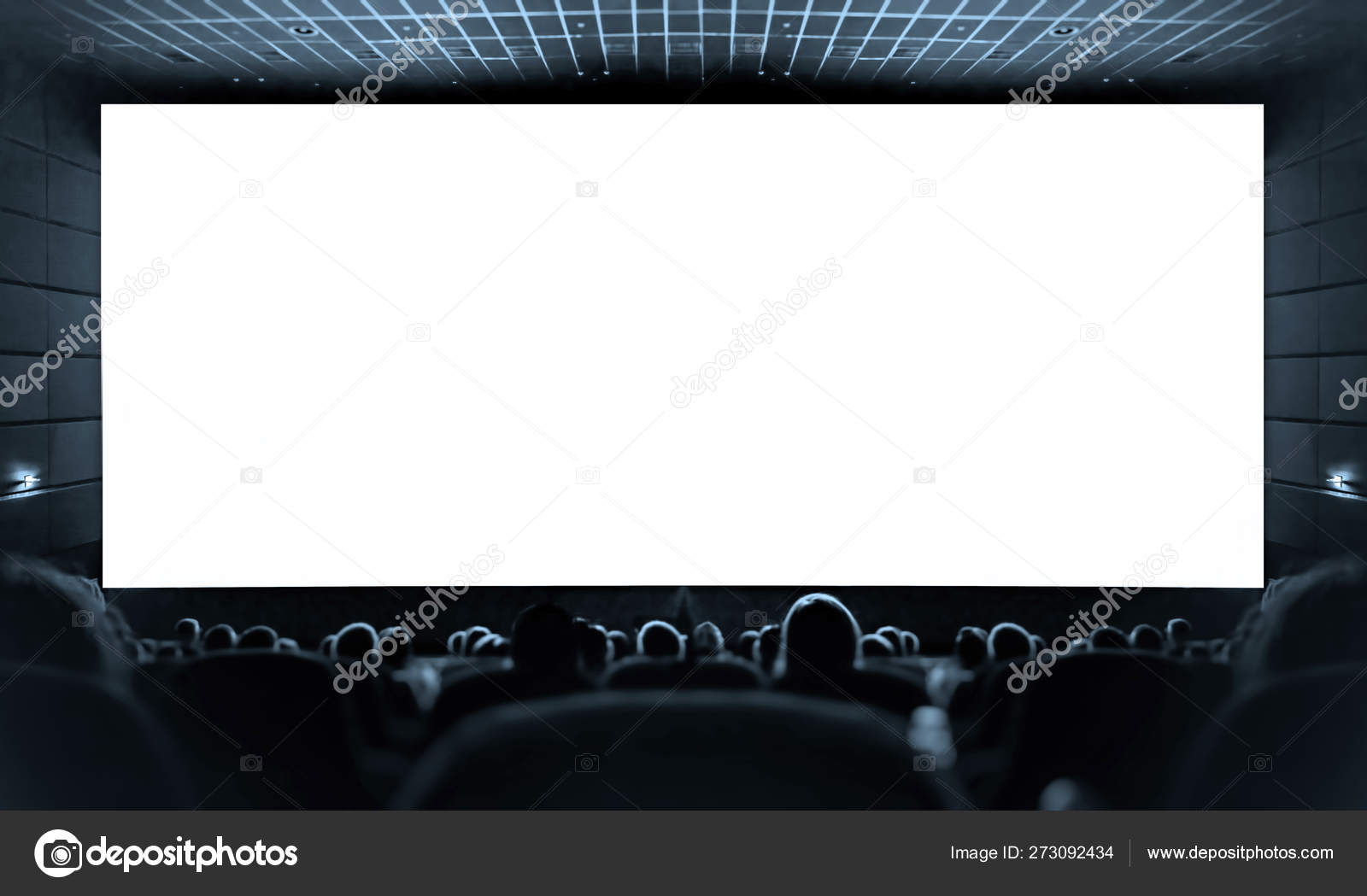 White screen in the cinema and the audience watching the movie. Cinema ...