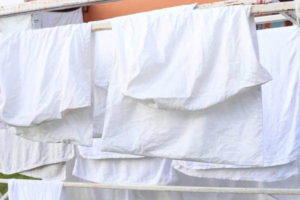 White blankets and white towels well wash and clean then drying with ...