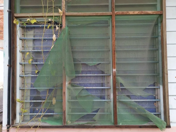 Broken Glass Window Torn Moquito Netting Stock Photo by ©sweemingyoung ...