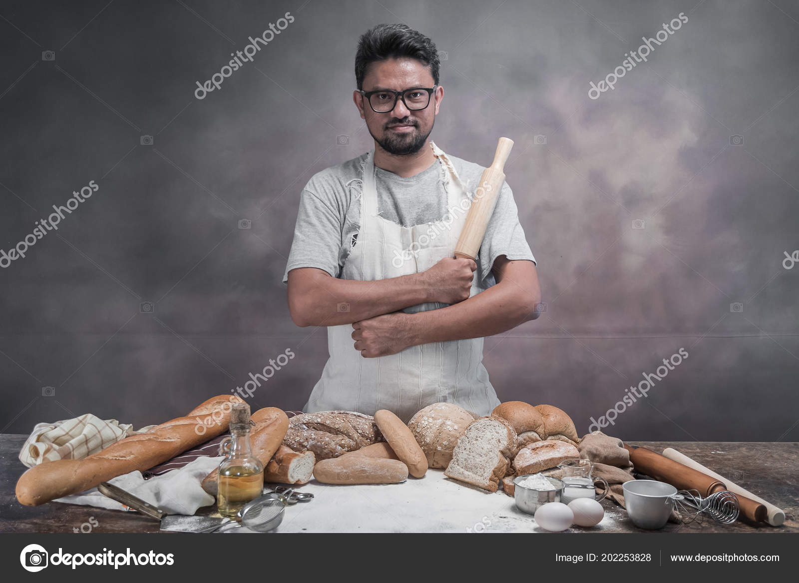 Asian Man Posing Table Buns Bread Stock Photo by ©aedkaDPS 202253828