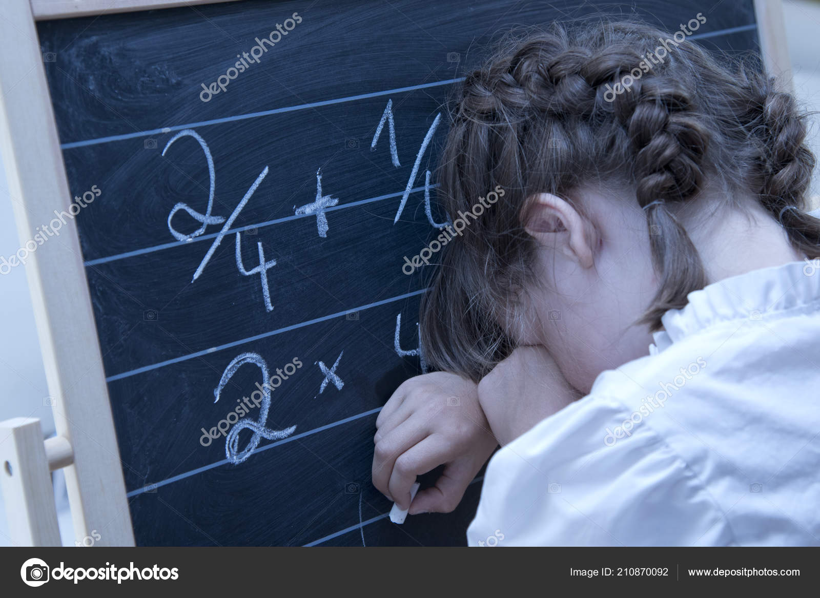Desperate Child Infront Blackboard Stock Photo by ©mletschert 210870092